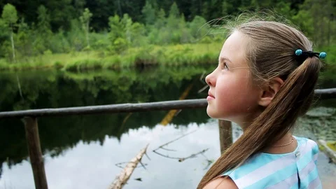 Close up view of lovely smiling little g... | Stock Video | Pond5