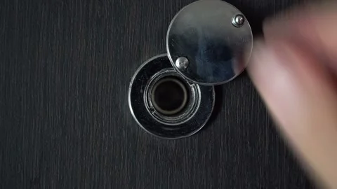 Close-up view pf Man Looking Through the... | Stock Video | Pond5