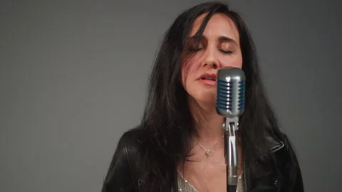 Close View of Singer in Black Leather Ja... | Stock Video | Pond5