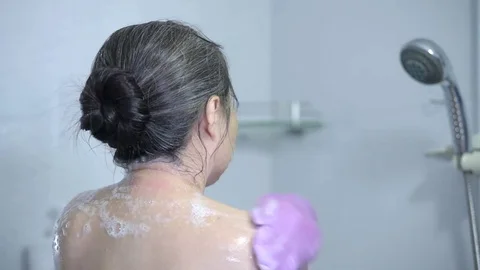 Close up view of woman showering in show... | Stock Video | Pond5