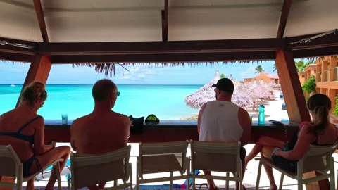 Close-up view of young couples sitting a... | Stock Video | Pond5