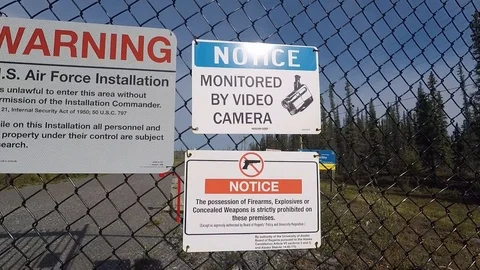 Close up of warning signs and high secur... | Stock Video | Pond5
