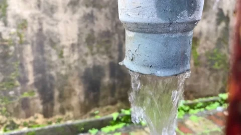 Close Up water flows out through the dra... | Stock Video | Pond5