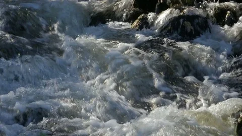 Close up of water stream with white and ... | Stock Video | Pond5