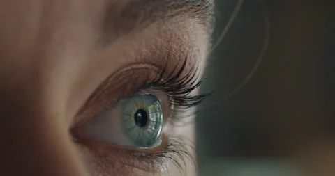close up woman eye looking out window bl... | Stock Video | Pond5