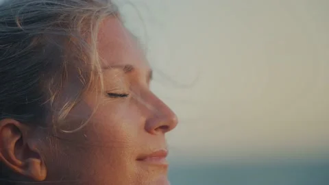 Close up of woman face meditating during... | Stock Video | Pond5