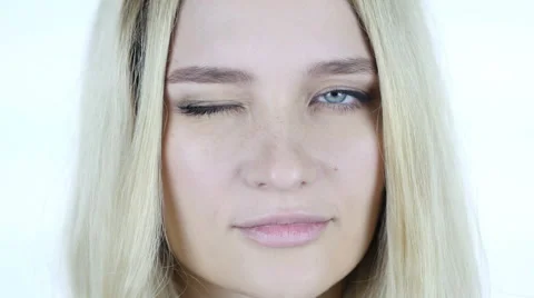 Close Up Of Woman Face, Winking Eyes | Stock Video | Pond5