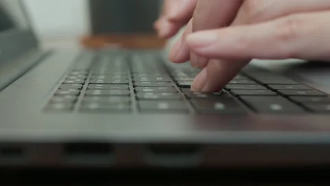 Close-up woman hand is typing laptop key... | Stock Video | Pond5