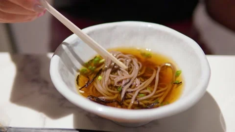 Close-up of a woman picking up with chop... | Stock Video | Pond5