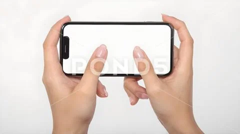 Close-Up of a Woman's Hand Using a Smartphone for Browsing or Online ...