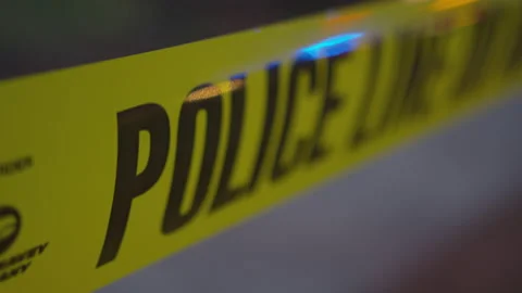 Close up of Yellow Police Tape Reflectin... | Stock Video | Pond5