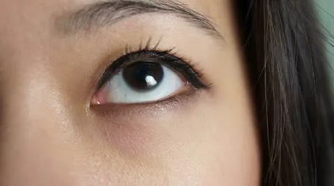 Close up Young Asian Eye Looking Up | Stock Video | Pond5