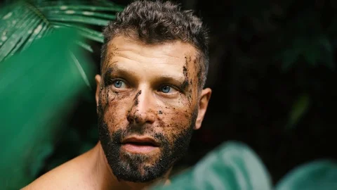 Close-up of a young handsome man in wild... | Stock Video | Pond5