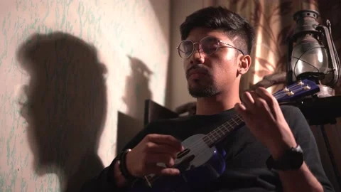 Playing Ukelele Stock Videos – Royalty-Free HD & 4K Videos | Pond5