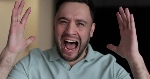 Close up of a young stressed man shoutin... | Stock Video | Pond5