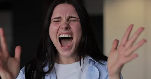 Close up of a young stressed woman shout... | Stock Video | Pond5