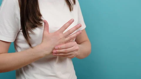 Close up of young woman scratching itch ... | Stock Video | Pond5