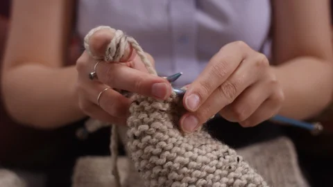 Close-up on a young woman's hands croche... | Stock Video | Pond5