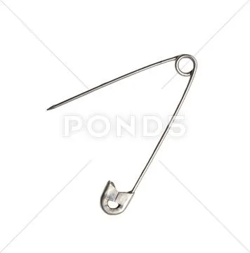 Closed safety pin. cut out, on white background. macro. on edge Stock ...