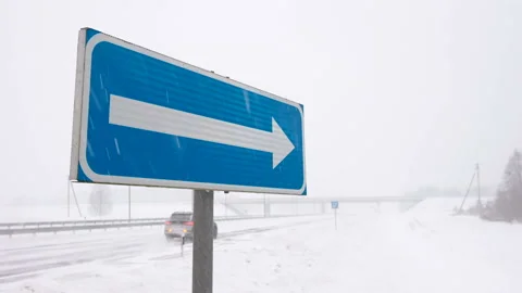 Closer look of the blue arrow signage on... | Stock Video | Pond5