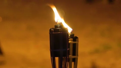 Closer look of the fire torches in the b... | Stock Video | Pond5