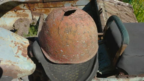 Closer look of the rusty hard hat on the... | Stock Video | Pond5