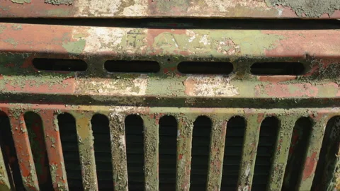 Closer look of the rusty red car on the ... | Stock Video | Pond5