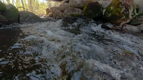 Closer look of the water on the river in... | Stock Video | Pond5