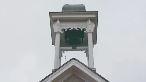 Closeup of bell tower on top of school b... | Stock Video | Pond5