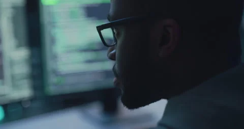 Closeup Black Man Looking at Computer Sc... | Stock Video | Pond5
