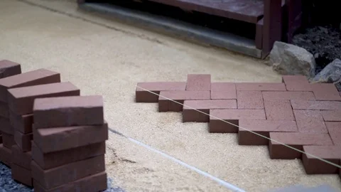 Closeup of the brick paving project show... | Stock Video | Pond5