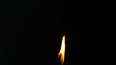 Closeup candle fire flame isolated burni... | Stock Video | Pond5