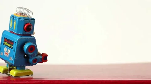 Closeup of clockwork robot walks on tabl... | Stock Video | Pond5