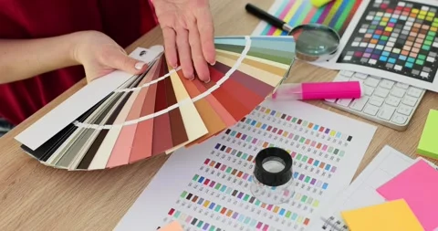 Closeup of color palette guide in hands ... | Stock Video | Pond5