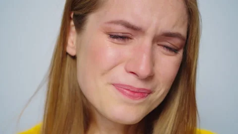 Closeup crying woman posing with sad moo... | Stock Video | Pond5