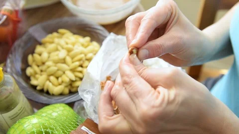 Closeup of female, woman hands peeling s... | Stock Video | Pond5