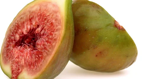 Closeup of fig fruit flesh. Isolated on ... | Stock Video | Pond5