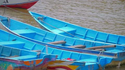 Closeup of fishing boats bouncing in rou... | Stock Video | Pond5
