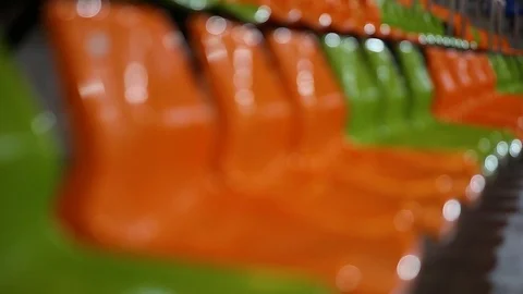 Closeup focus racking shot orange stadiu... | Stock Video | Pond5