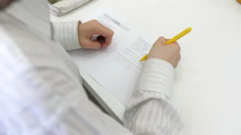 Closeup hand of child write in notebook.... | Stock Video | Pond5