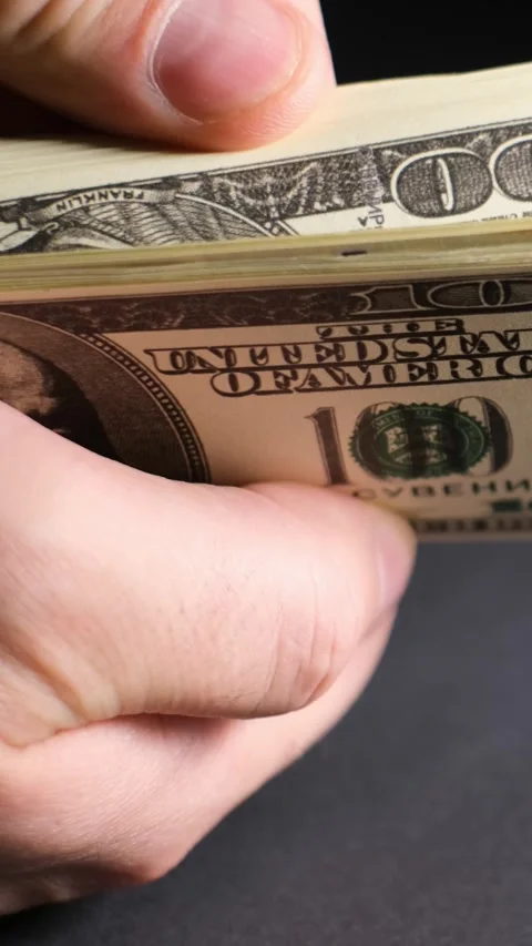 Gripping Money Stock Videos – Royalty-Free HD & 4K Videos