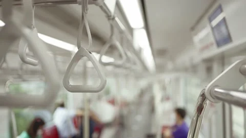 Closeup handle loop in a sky train with ... | Stock Video | Pond5