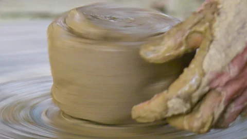 closeup large pottery clay lump rotates ... | Stock Video | Pond5