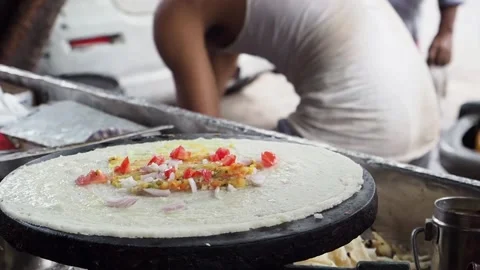 Making Dosa Stock Footage ~ Royalty Free Stock Videos | Pond5
