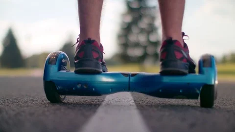 Closeup of man legs on two wheels electr... | Stock Video | Pond5