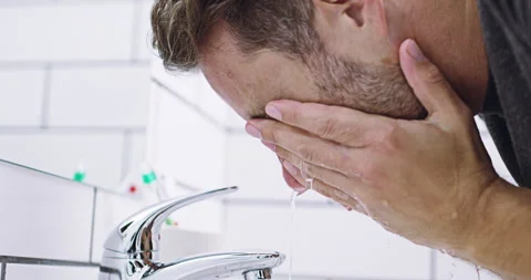Closeup of man washing face, hygiene and... | Stock Video | Pond5