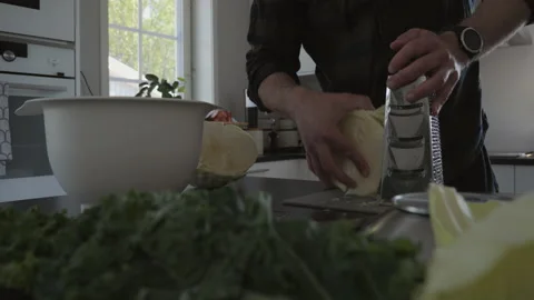 Closeup of man's hand grating cabbage fo... | Stock Video | Pond5