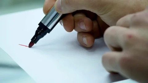 Closeup of man's hand writing on paper w... | Stock Video | Pond5