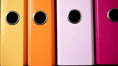 Closeup many colorful binders as office ... | Stock Video | Pond5