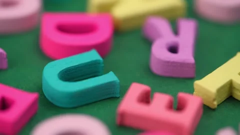 closeup multicolored letters rotating on... | Stock Video | Pond5